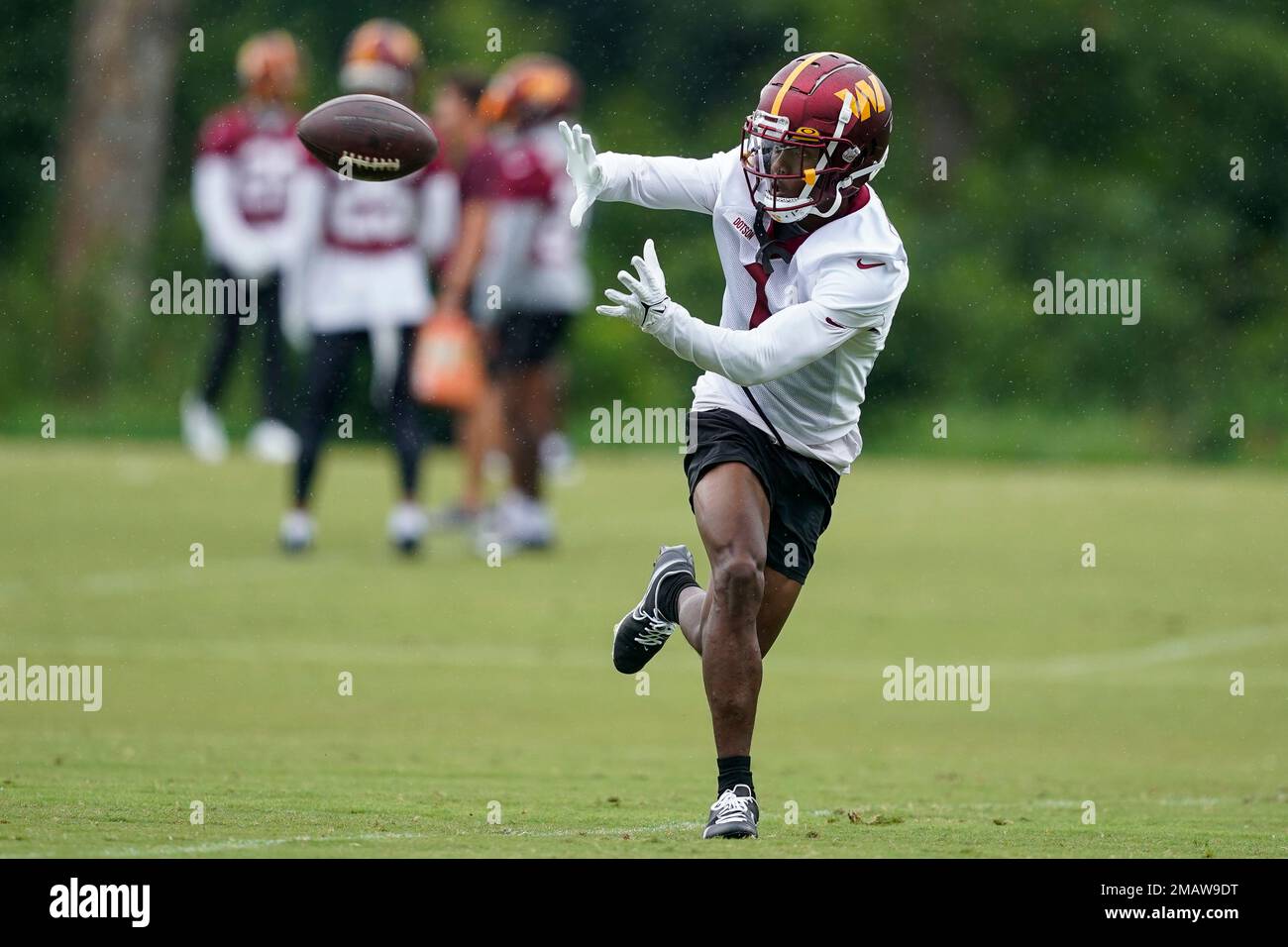 Washington Commanders wide receiver Jahan Dotson (1) catches the ball ...