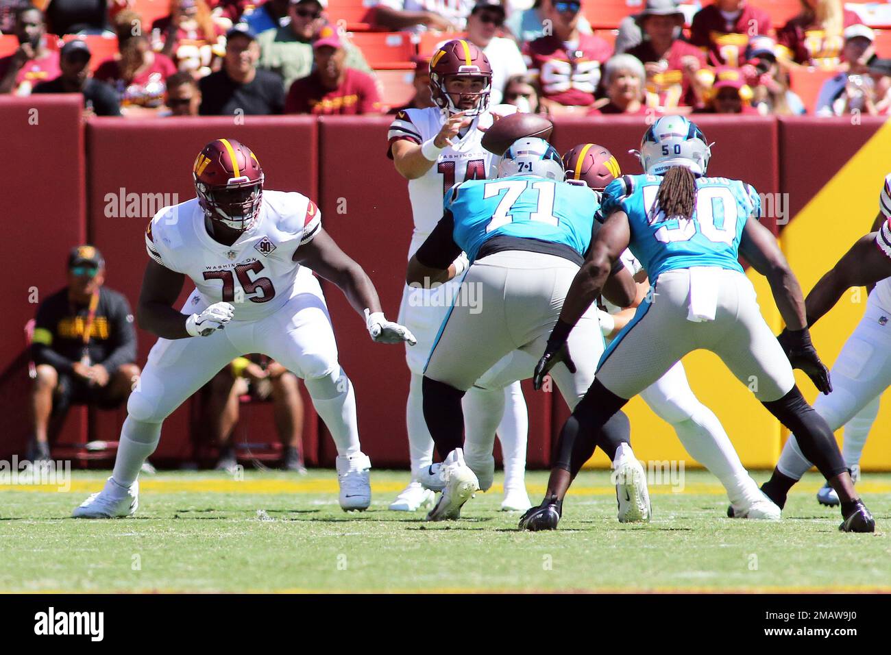 Washington Commanders guard Chris Paul (75) blocks during an NFL ...