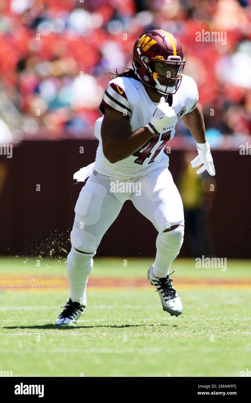 Washington Commanders linebacker Tre Walker (41) runs during an NFL ...