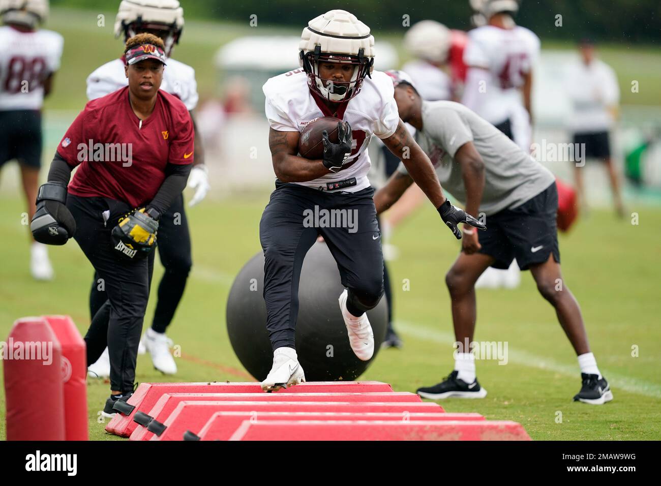 Washington Commanders running back Jaret Patterson runs a drill during ...