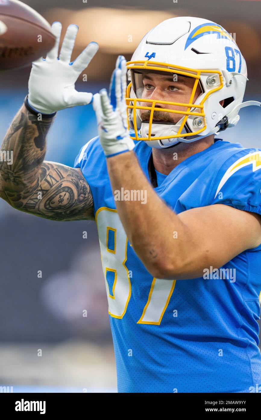 Tight end (87) Hunter Kampmoyer of the Los Angeles Chargers warms up ...