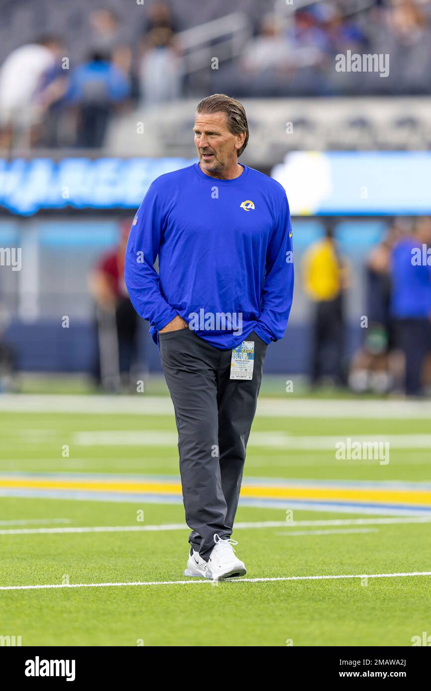 Coach Greg Olson of the Los Angeles Rams coaches before playing against ...