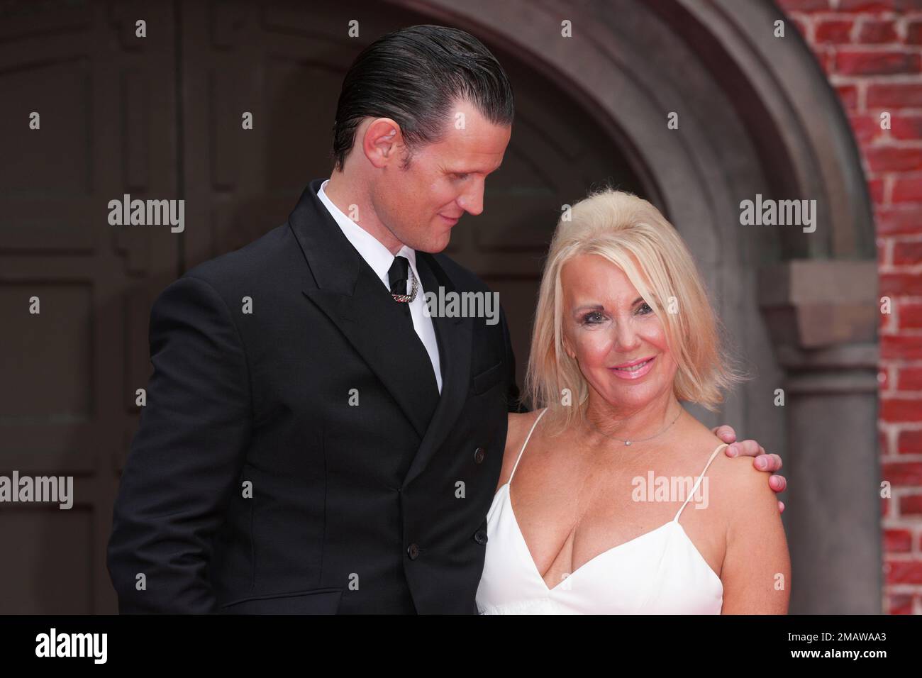 Matt Smith and Lynne Smith pose for photographers upon arrival for the ...