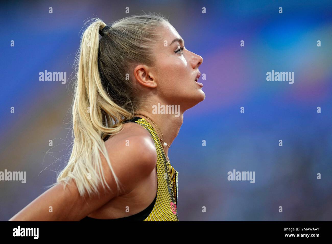 Alica Schmidt, of Germany, prepares to run in a Women's 400 meters heat ...