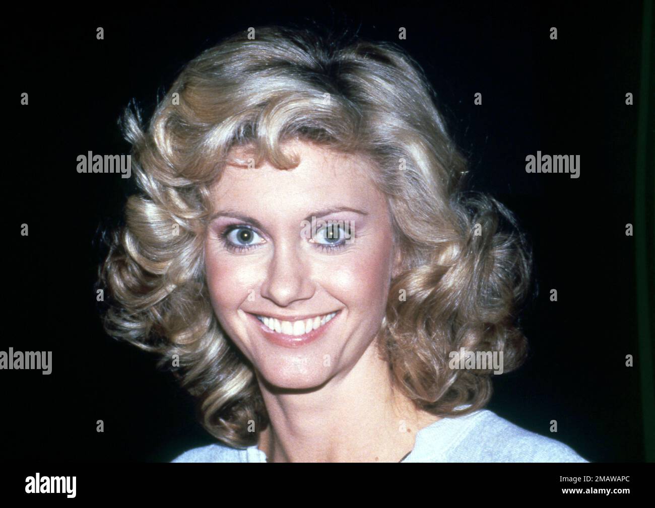 Singer Olivia Newton-John smiling in 1979. (AP Photo Stock Photo - Alamy