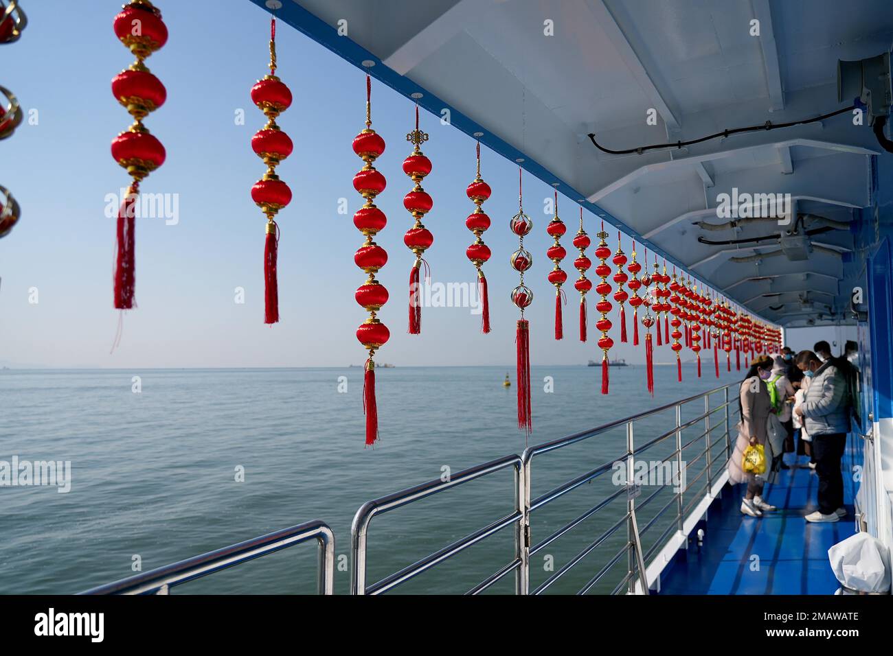 Tourists feel the festival atmosphere on the sightseeing boat on the ...