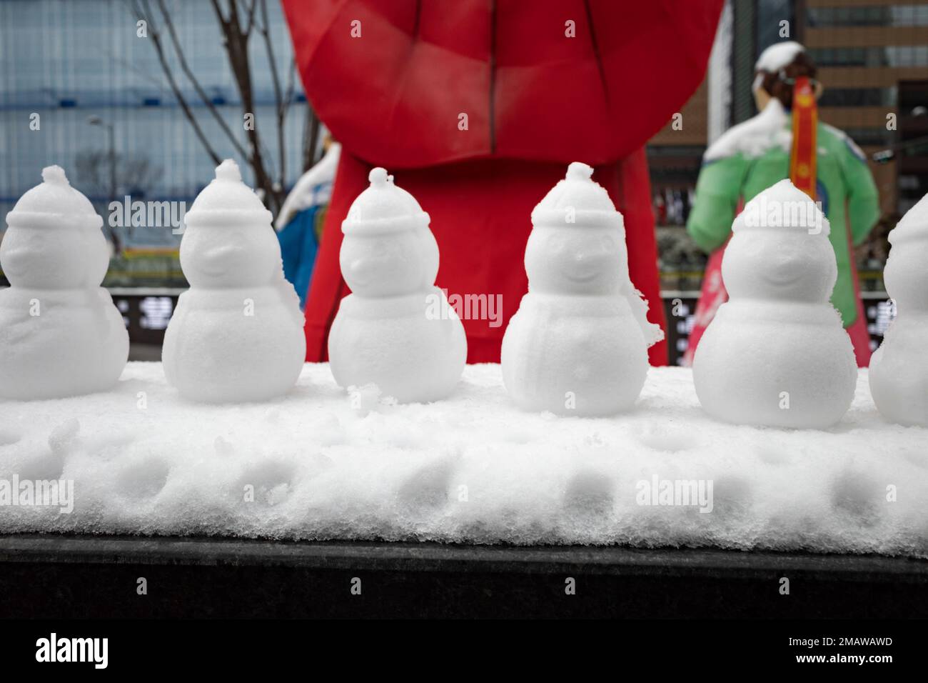 Seoul, Korea. 21st Dec, 2022. Perfectly molded snowmen near the Statue ...