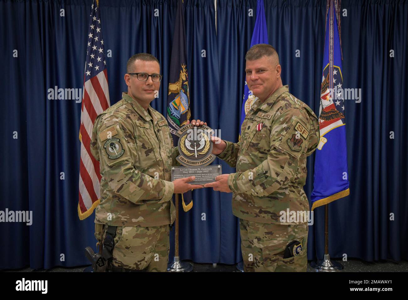 Lt. Col. Thomas Gawrych receives a gift from 110th Security Forces ...