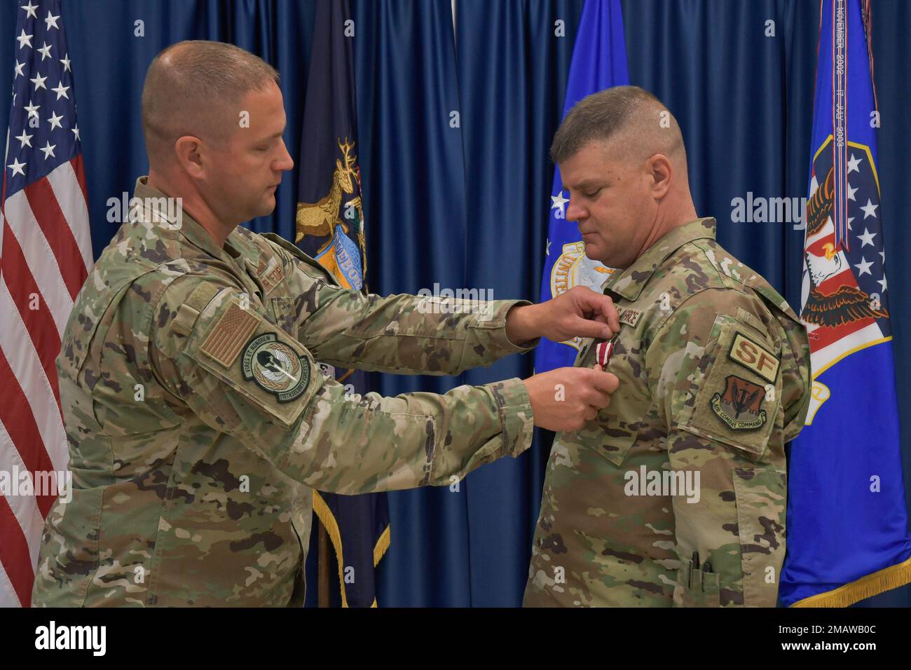 Lt. Col. Thomas Gawrych receives the Meritorious Service Medal for his ...