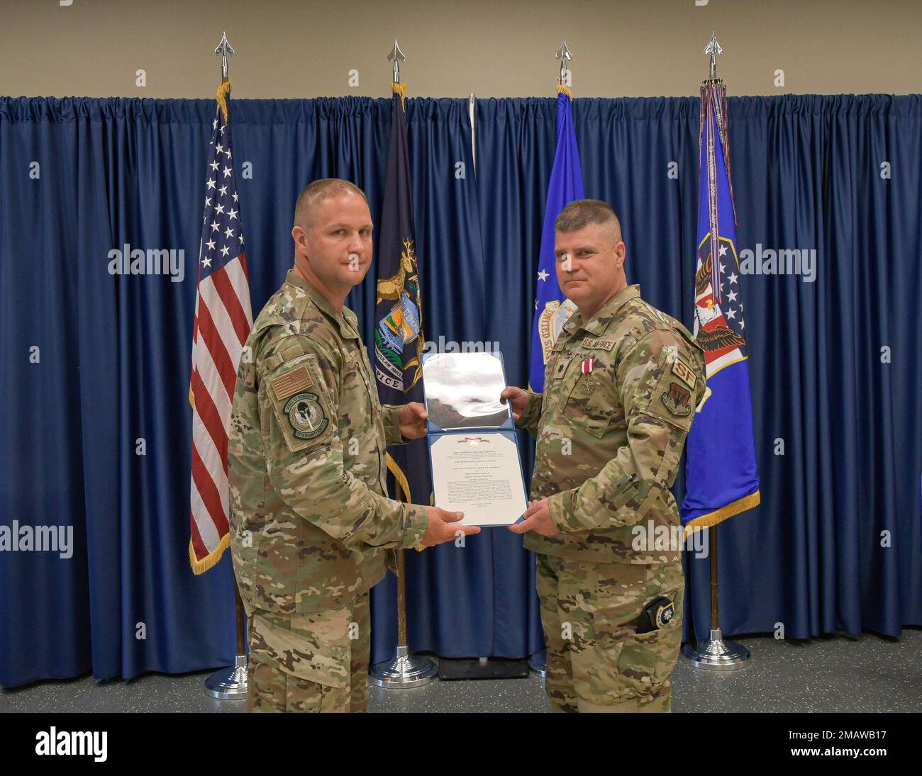 Lt. Col. Thomas Gawrych receives the Meritorious Service Medal for his ...