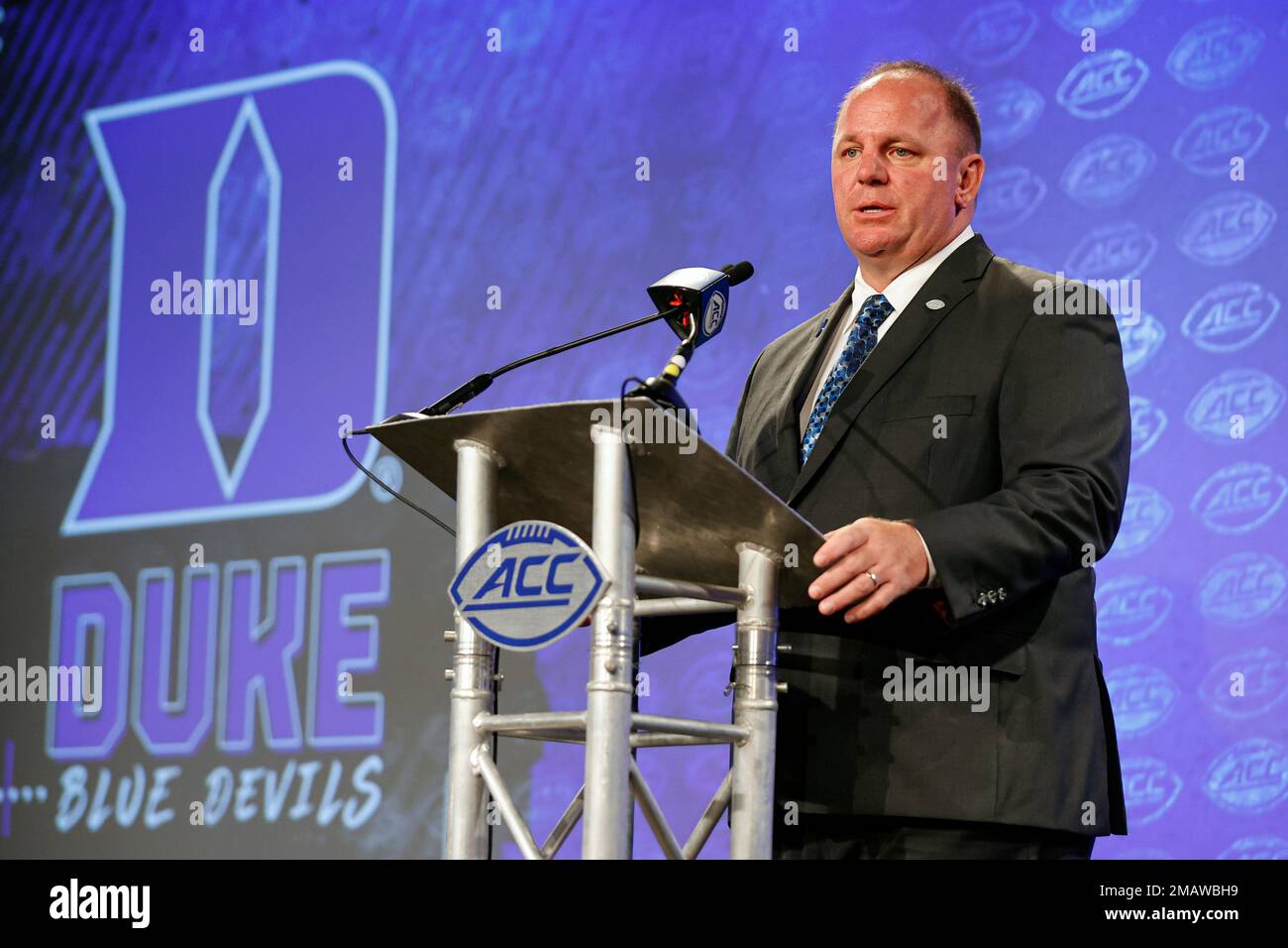 FILE - Duke head coach Mike Elko answers a question at the NCAA college ...