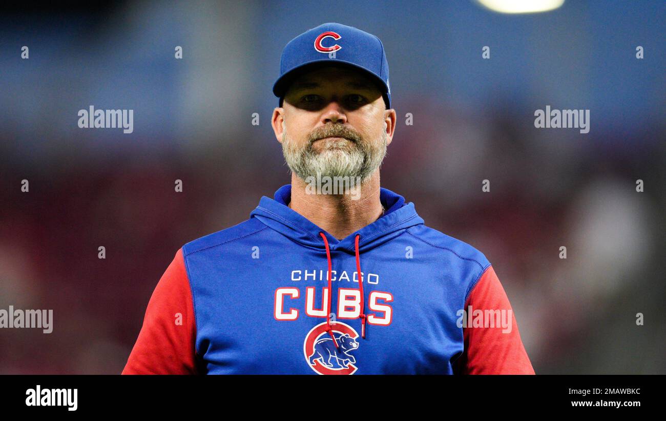 Chicago Cubs manager David Ross walks to the dugout during a baseball ...