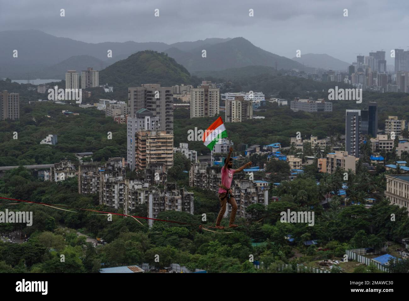 Indian highliner Harshdeep Pawar walks holding the Indian flag on ...