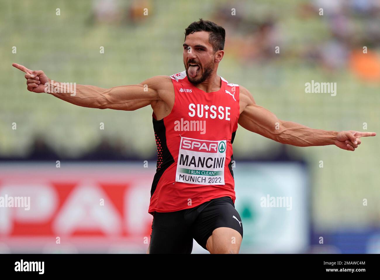 Pascal Mancini, of Switzerland, reacts after winning a Men's 100 meters ...