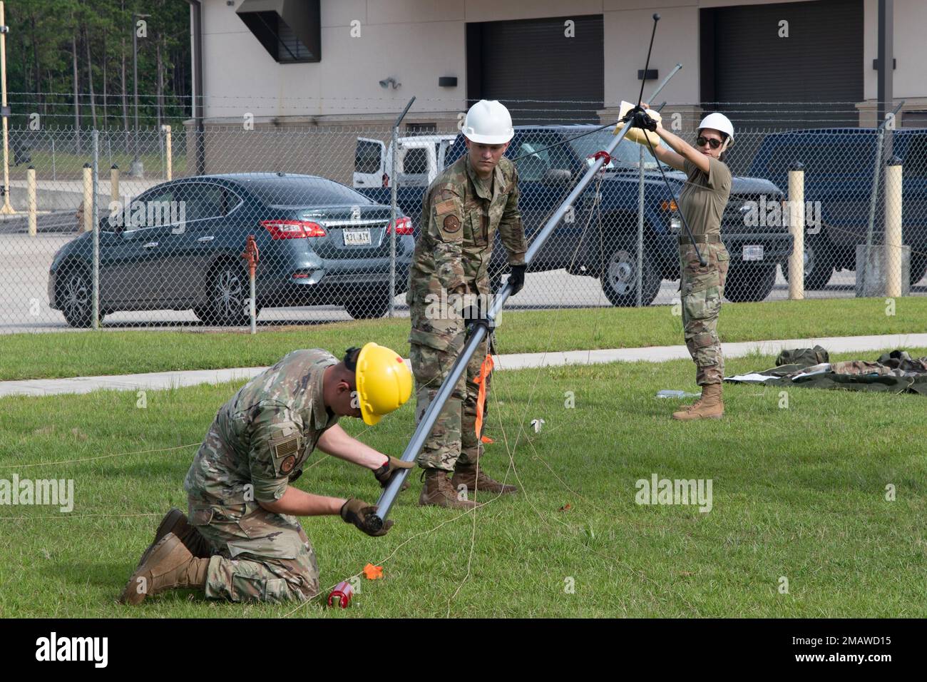 Members of the 239th Combat Communications Squadron ready an AT-420 ...