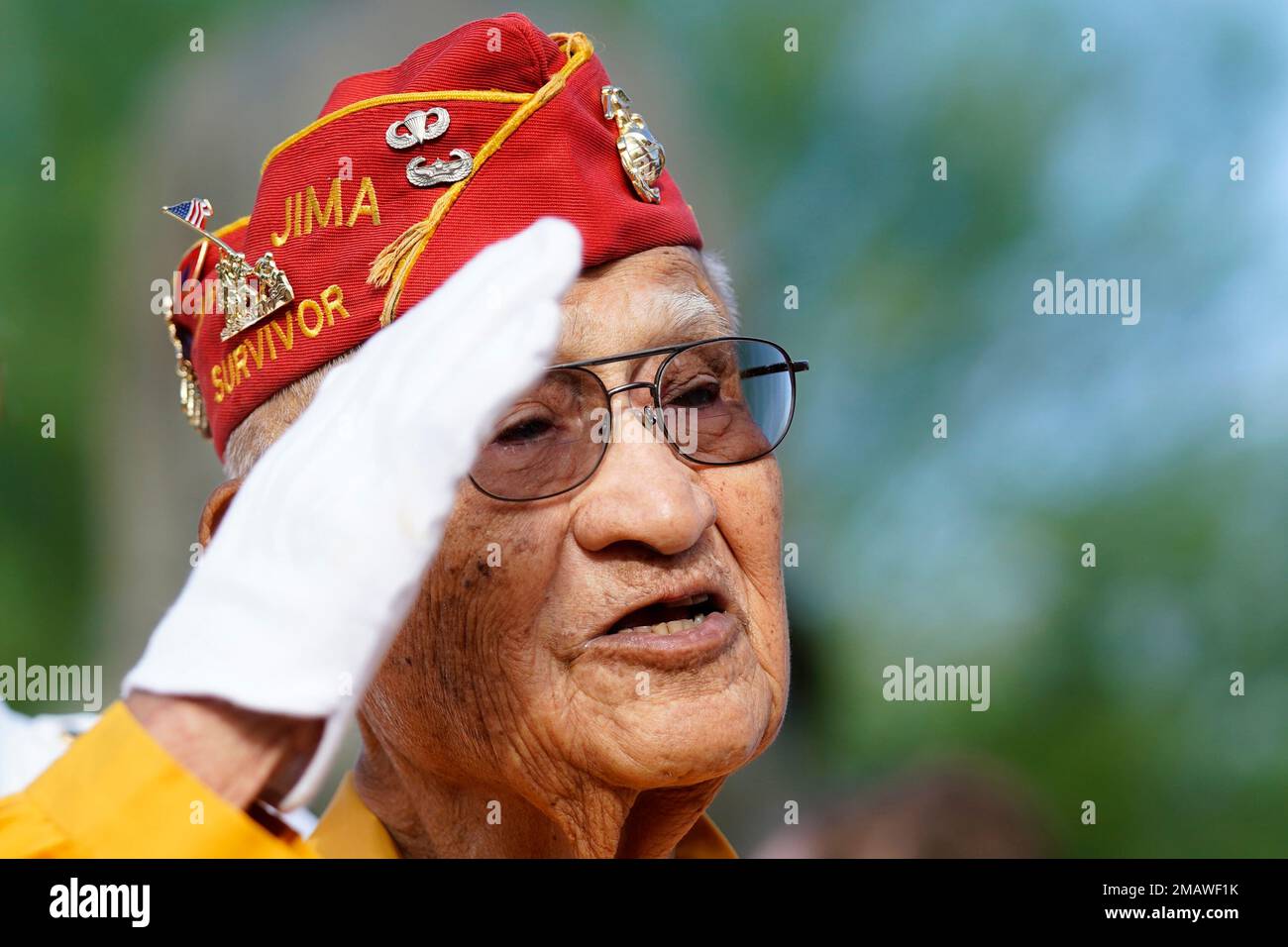 Navajo Code Talker Thomas Begay salutes the flag at the Arizona State ...