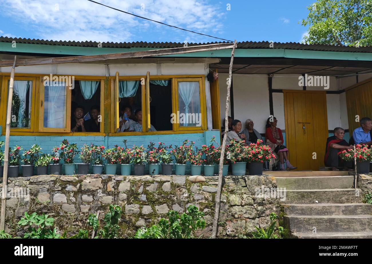 Boys wave the Naga flag while watching celebrations marking the Nagas ...