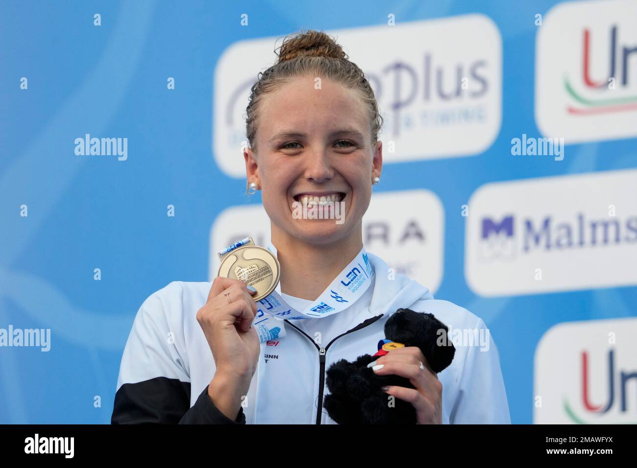 Germany's Isabel Marie Gose celebrates on the podium after winning a ...