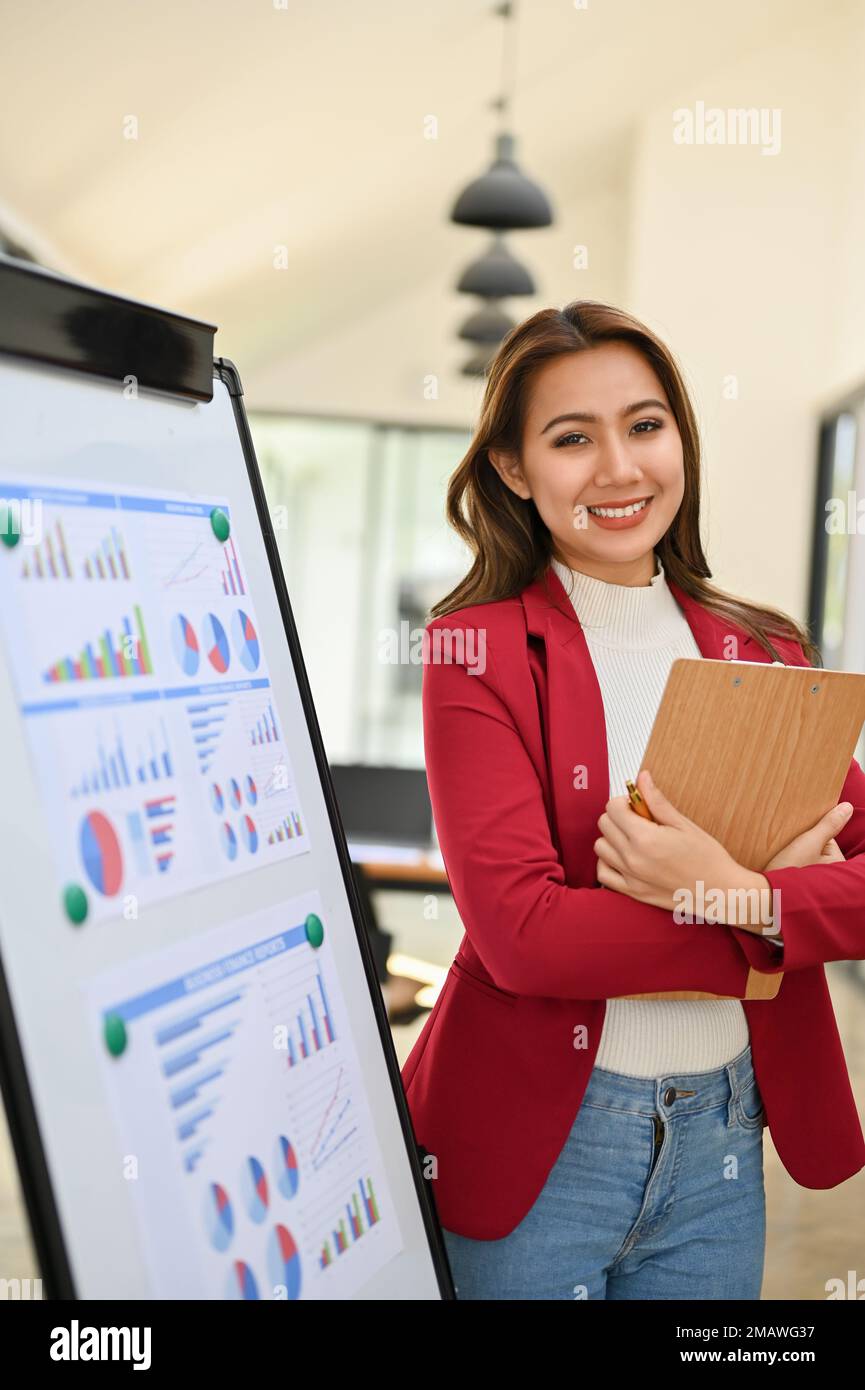 Portrait, Confident and charming millennial Asian businesswoman or ...