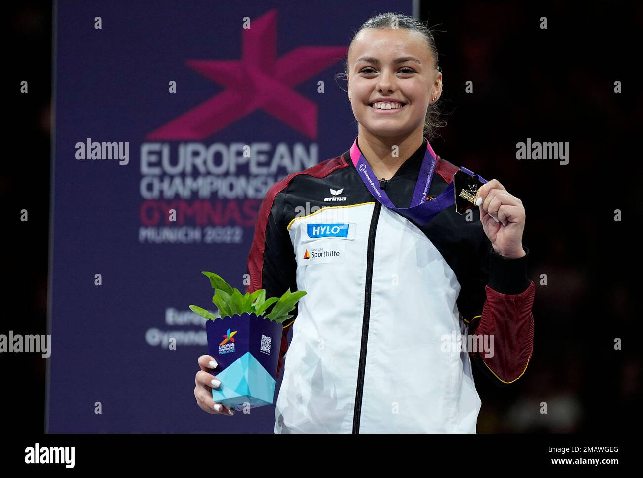 Gold medal winner Germany's Emma Leonie Malewski poses on the podium ...