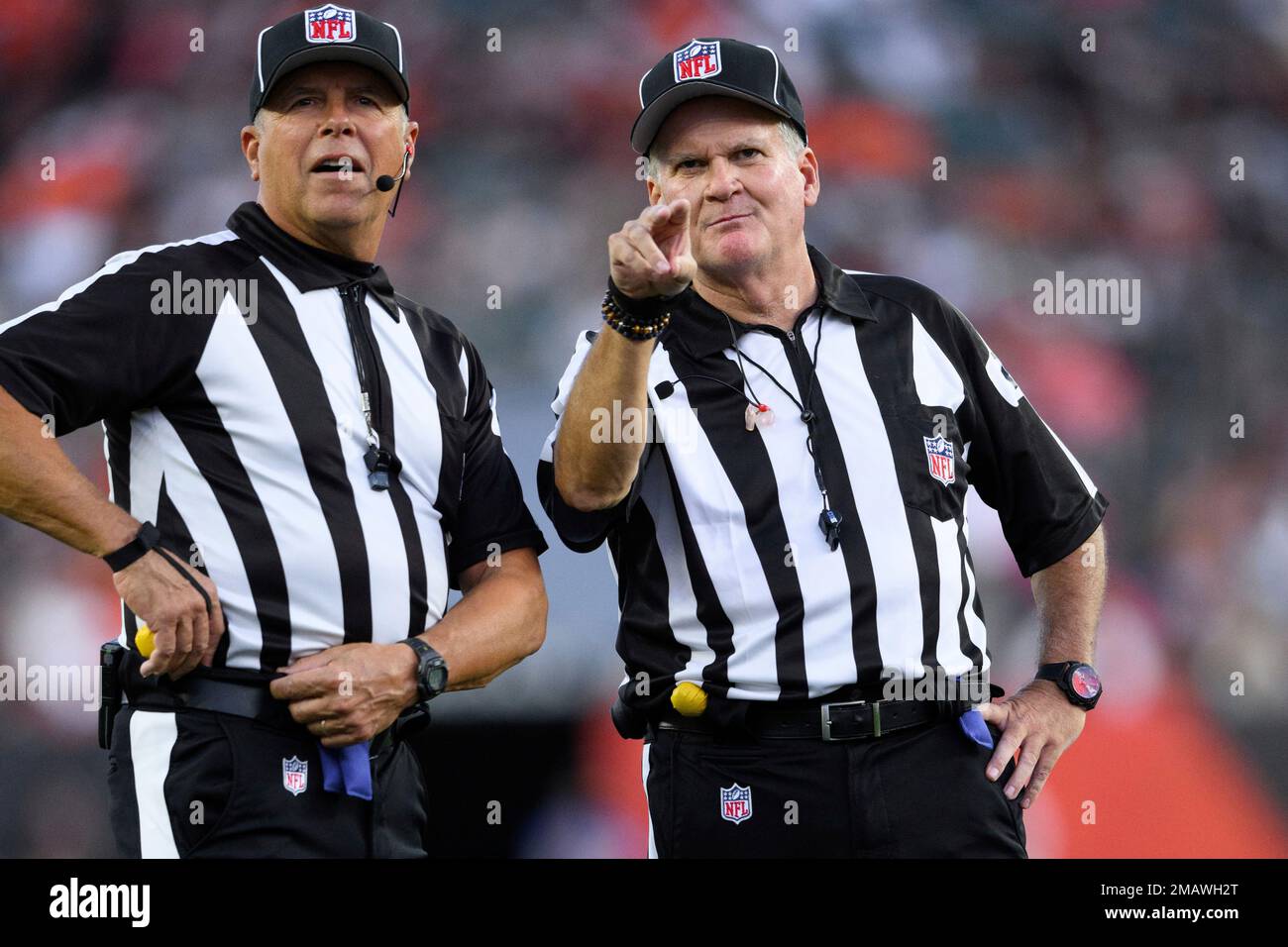 NFL down judge Jim Mello (48) and NFL side judge Jeff Lamberth (21) on the field during an NFL ...