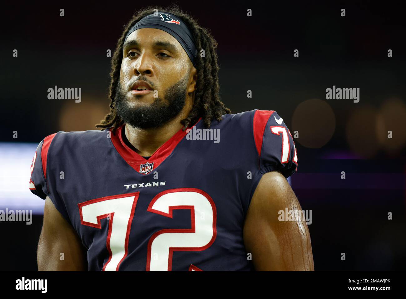 Houston Texans offensive lineman Myron Cunningham (72) walks off the ...