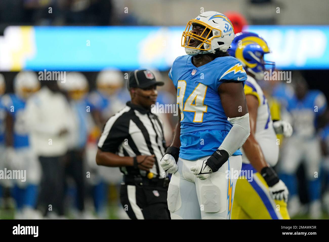 Los Angeles Chargers linebacker Chris Rumph II celebrates after sacking ...