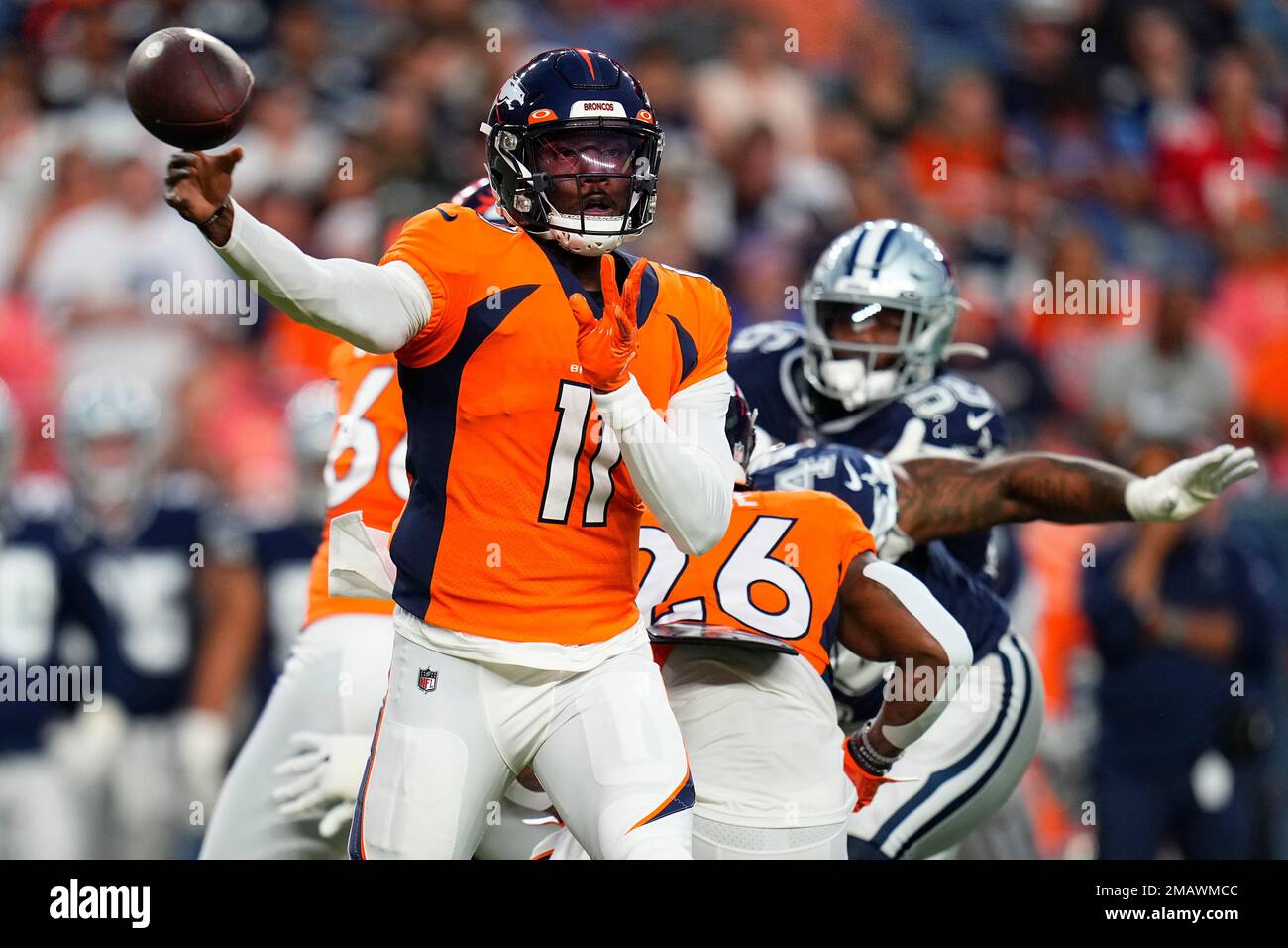 Denver Broncos quarterback Josh Johnson (11) throws during the first ...