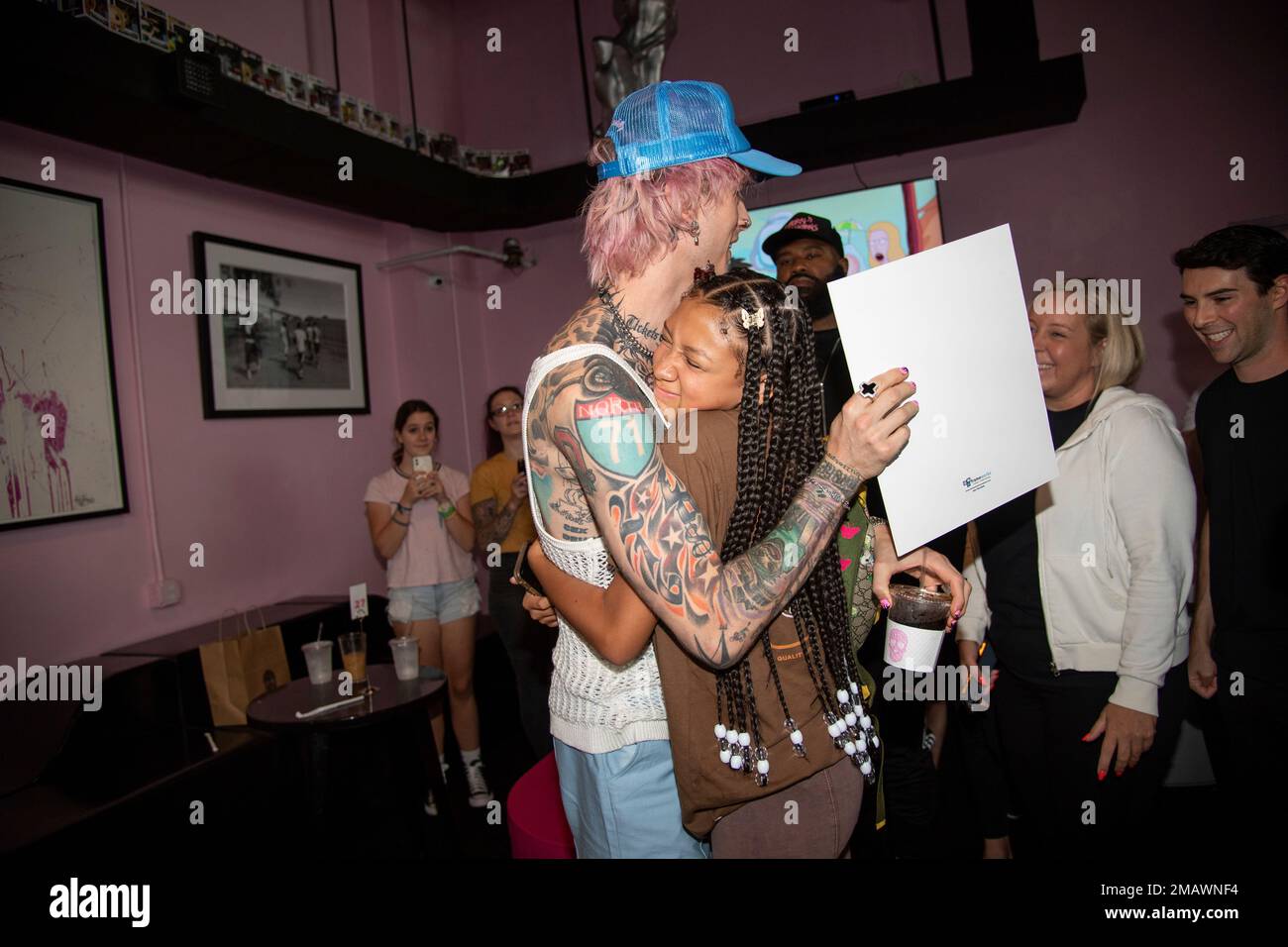 Machine Gun Kelly, left, and his daughter Casie Colson Baker are seen ...