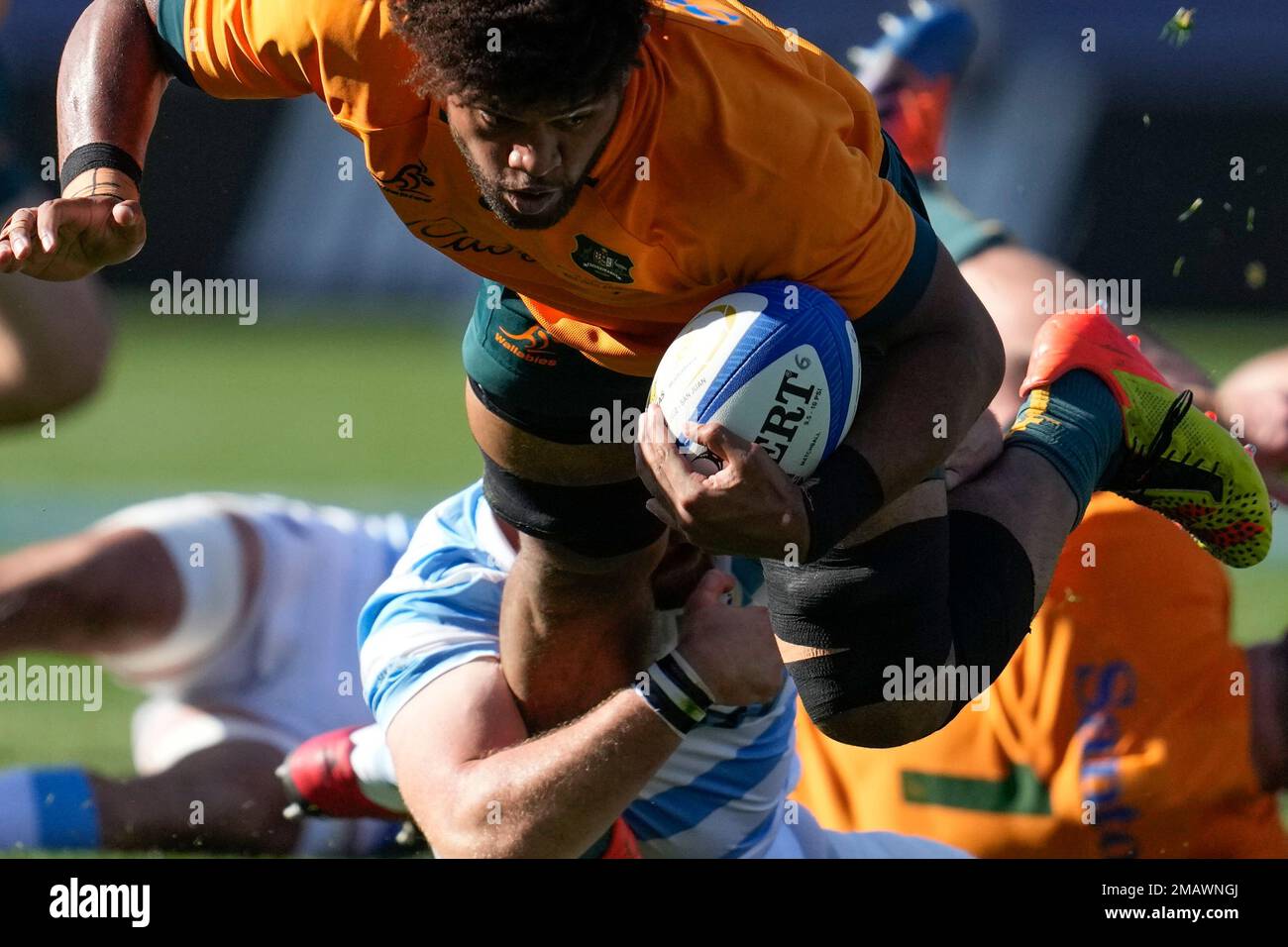 Australia's Rob Valetini is tackled by Argentina's Julian Montoya ...