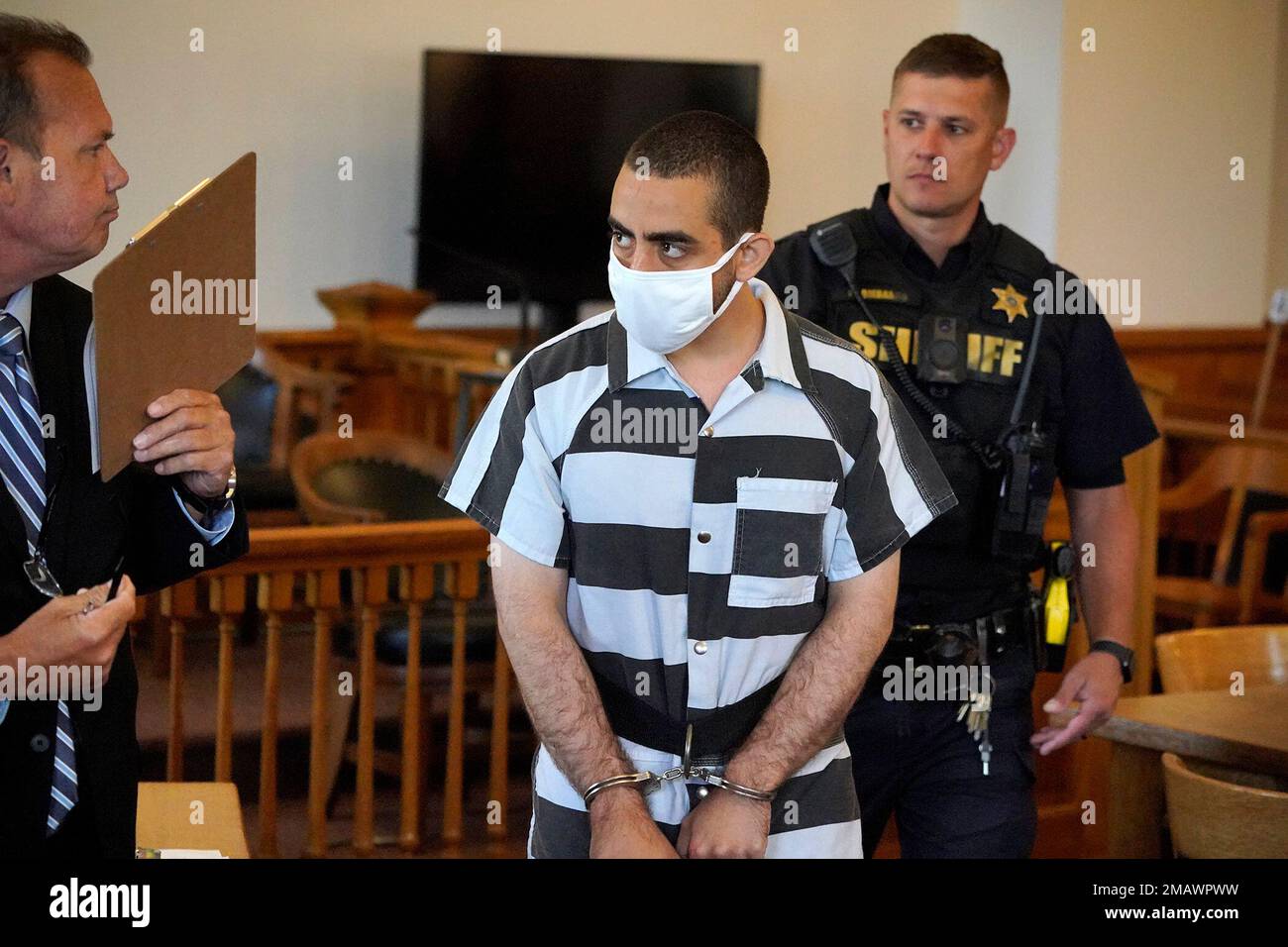 Hadi Matar, 24, center, arrives for an arraignment in the Chautauqua ...