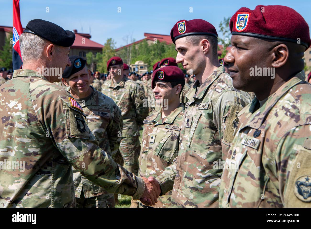 U.S. Army Chief of Staff, Gen. James McConville, presents Soldiers with ...