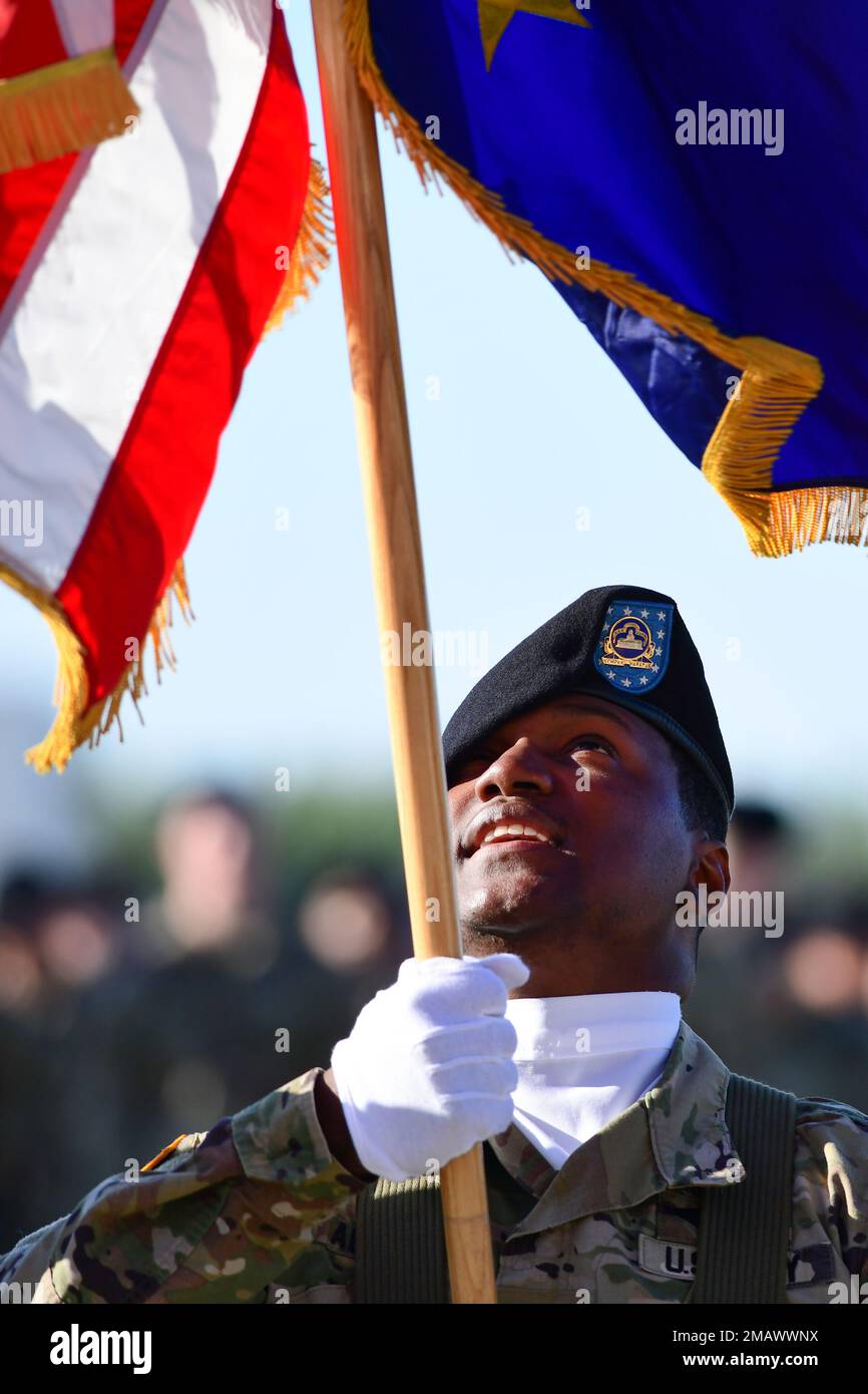 Staff Sgt. Reginald Allen carries the Alaska flag in the color guard ...