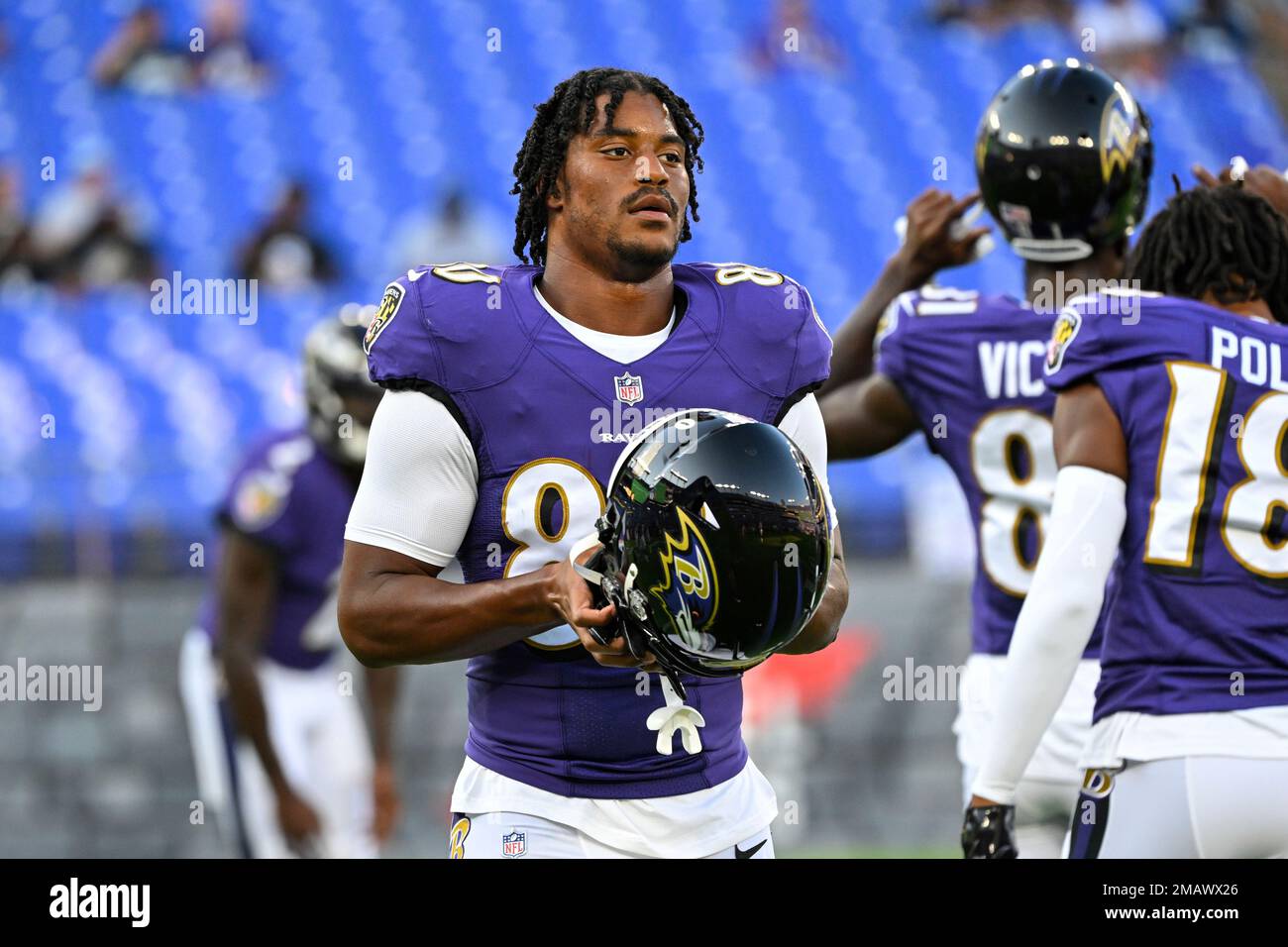 Baltimore Ravens tight end Isaiah Likely looks on during pre-game warm ...