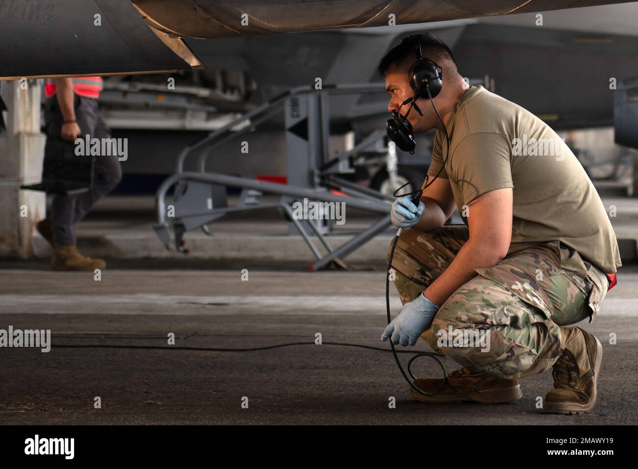 A U.S. Air Force crew chief assigned to the 154th Aircraft Maintenance ...