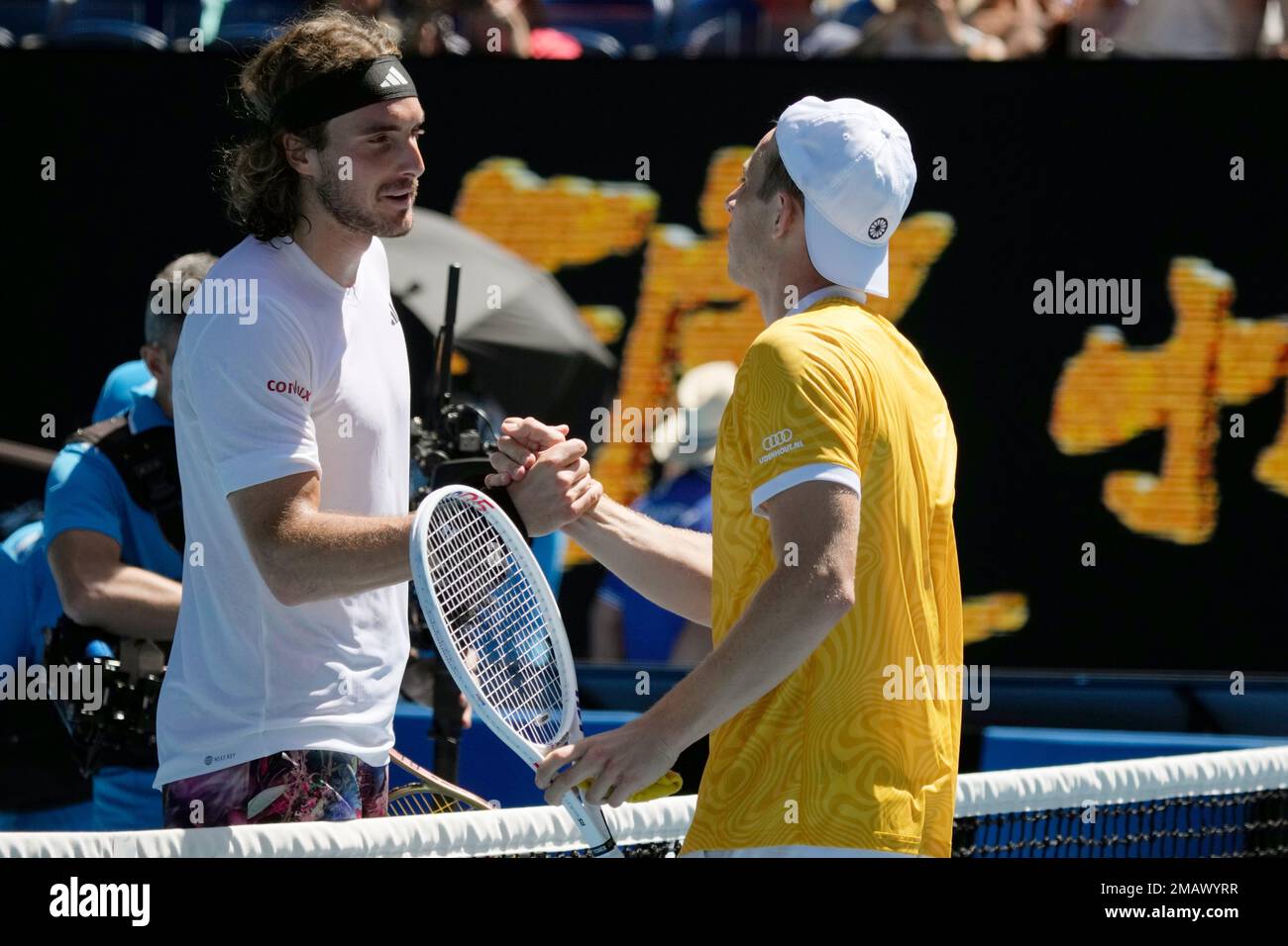 Stefanos Tsitsipas, left, of Greece is congratulated by Tallon ...