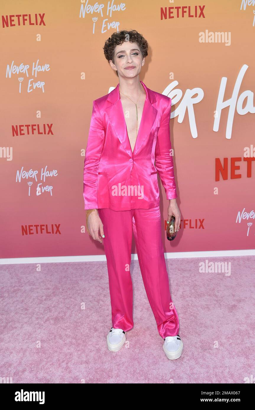 Dino Petrera arrives at the season three premiere of "Never Have I Ever ...