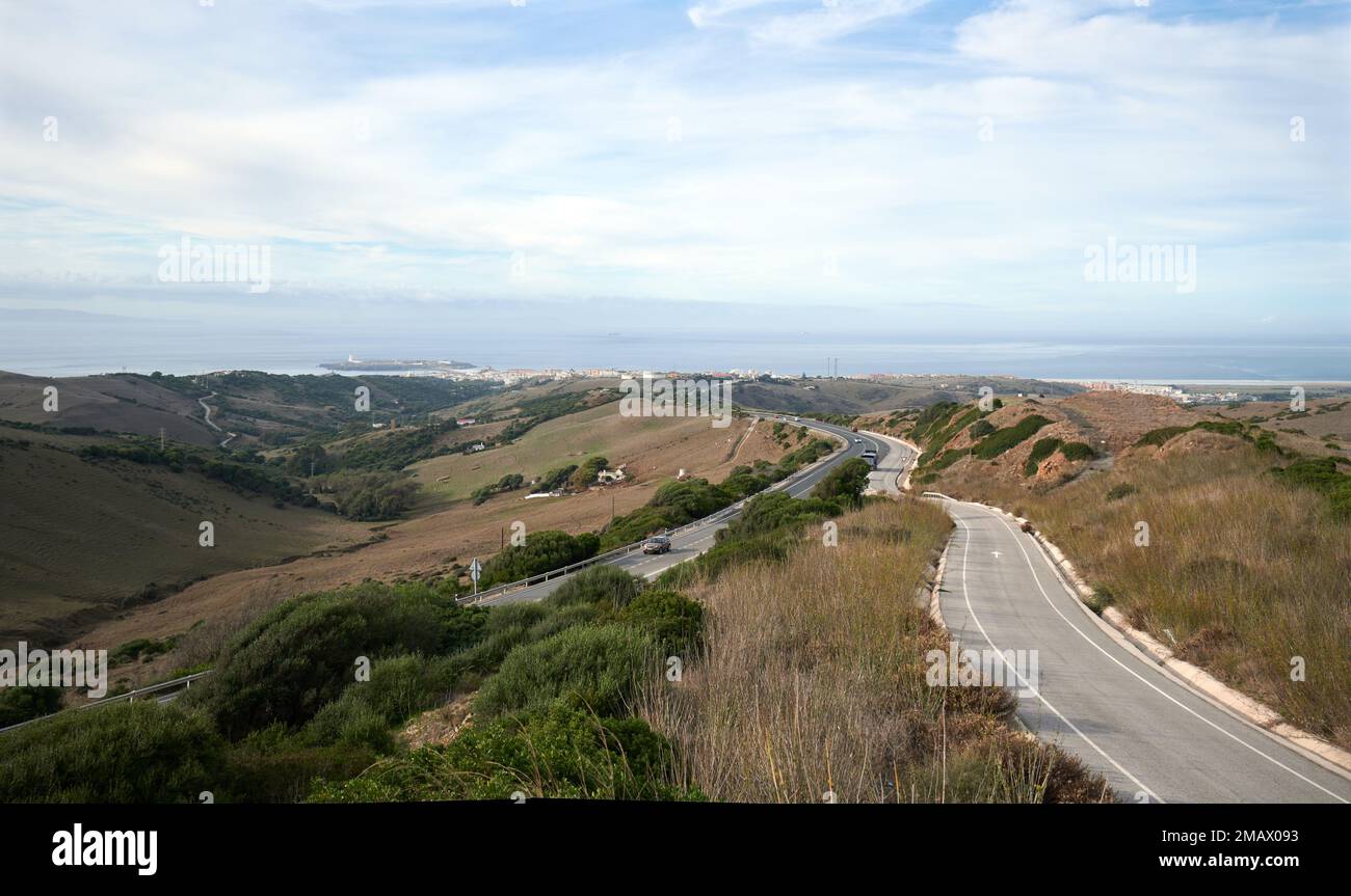 A scenic view of a landscape filled with small hills and valleys seen ...
