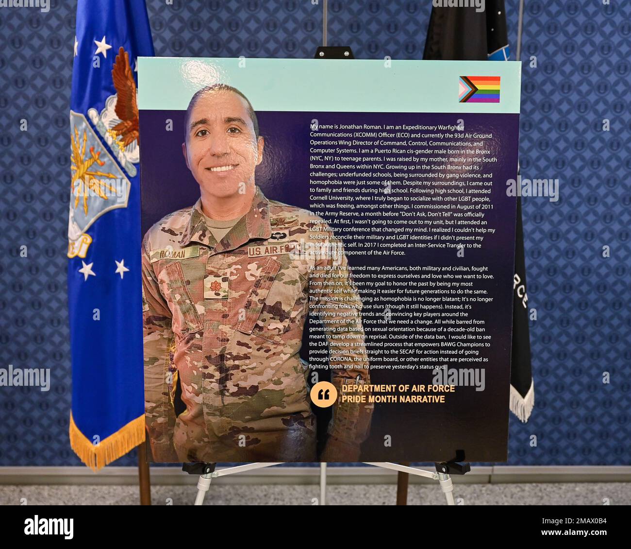 A poster is displayed during a Department of the Air Force Pride ...