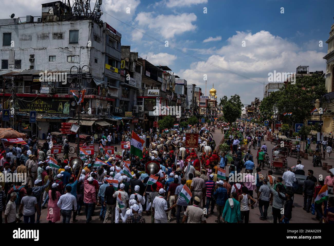 People participate in a 'Tiranga rally" or Tricolor flag rally ...