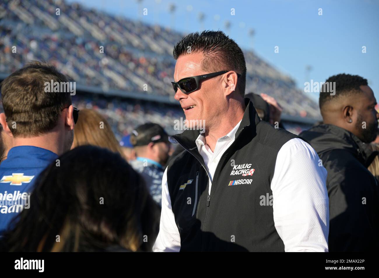 Kaulig Racing owner Matt Kaulig stands on pit road before a NASCAR ...