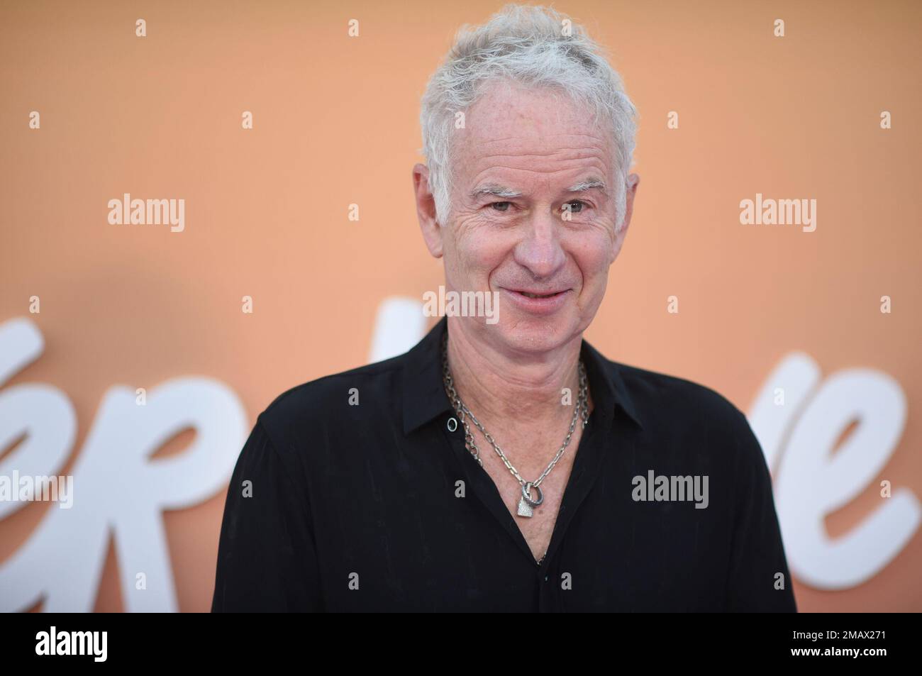 John McEnroe arrives at the season three premiere of "Never Have I Ever ...