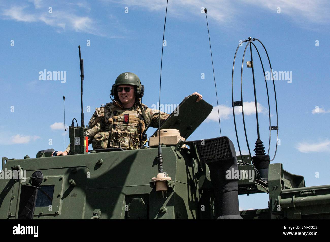 The vehicle commander of a M142 High Mobility Artillery Rocket System ...