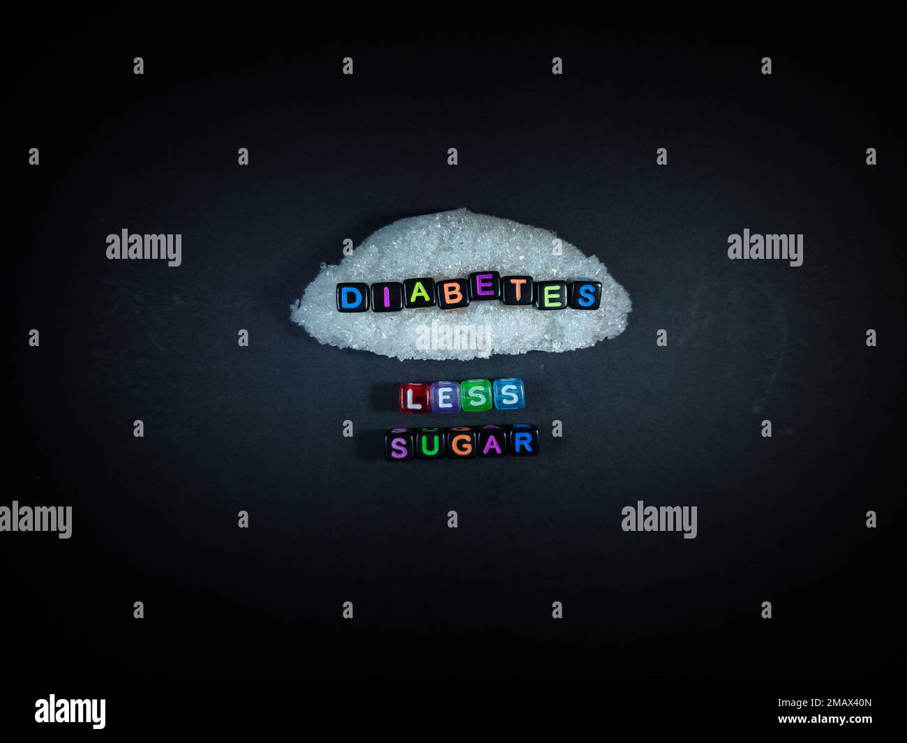 Black bead with color letter in word DIABETES LESS SUGAR with sugar and ...
