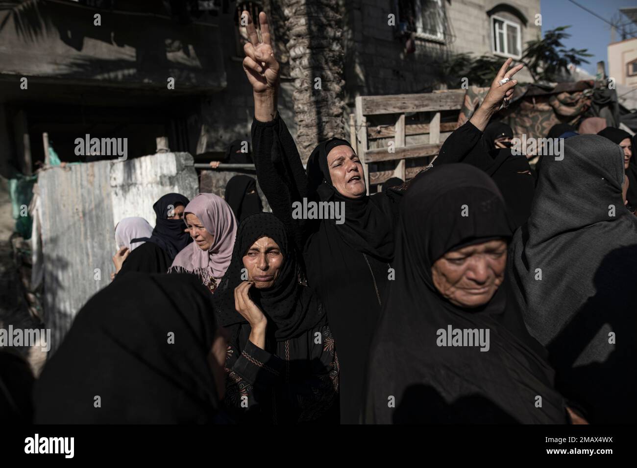 Mourners react during the funeral of 11-year-old Layan al-Shaer in Khan ...
