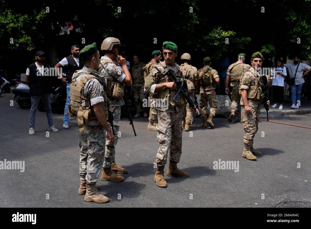 Lebanese security forces secure the area outside a bank in Beirut ...