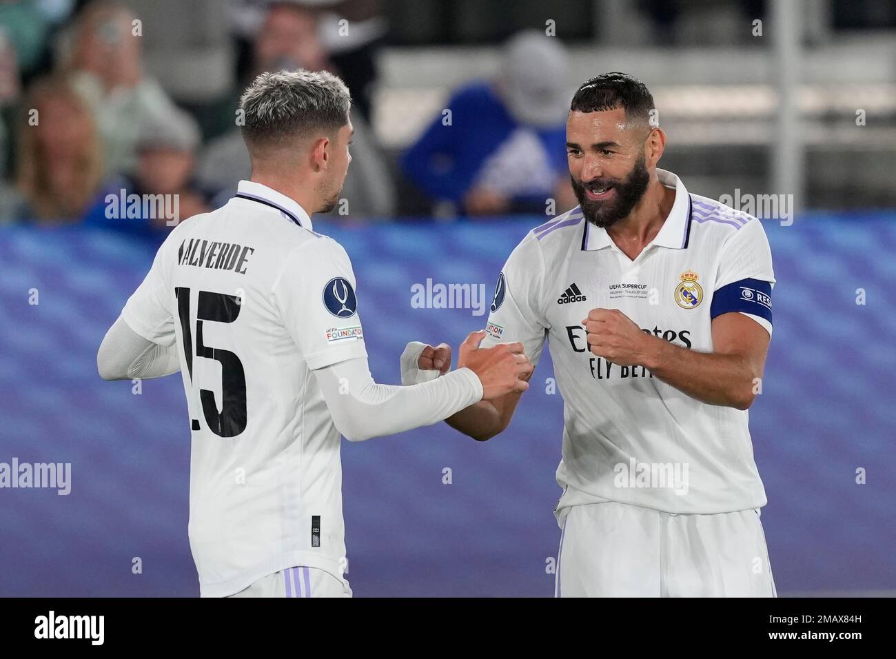 Real Madrid's Karim Benzema, right, celebrates with his teammate ...