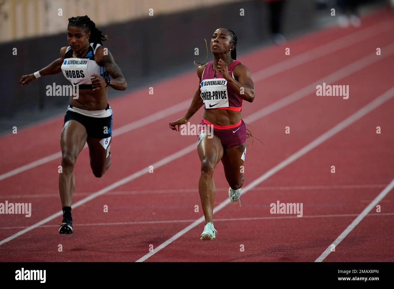 Shelly-Ann Fraser-Pryce of Jamaica, right, wins the women's 100m during ...