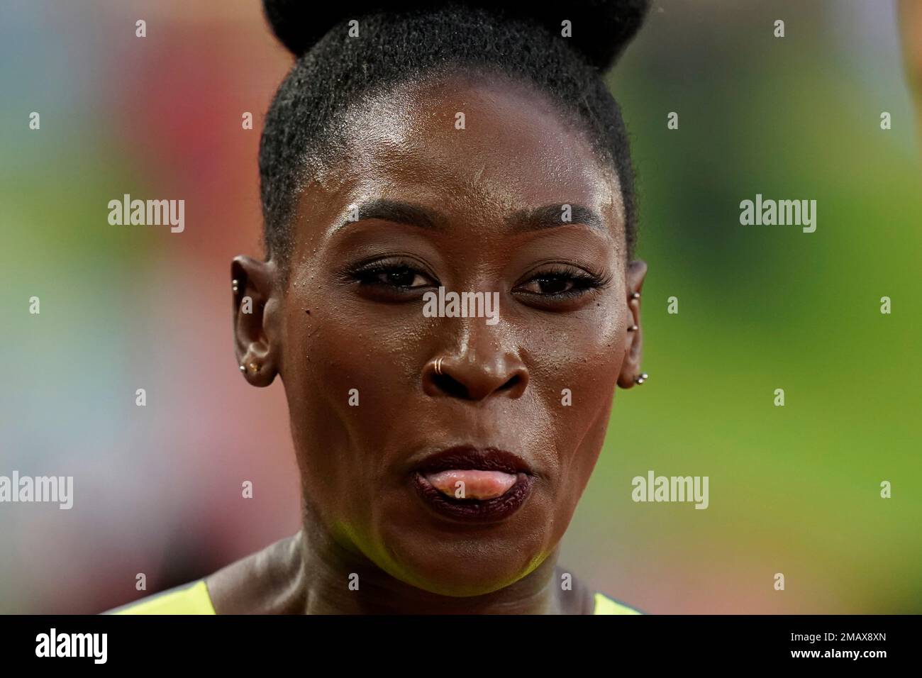 Rushell Clayton of Jamaica wins the women's 400m hurdles final during ...