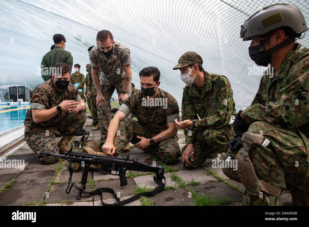 Members of the Japan Ground Self-Defense Force, Amphibious Rapid ...